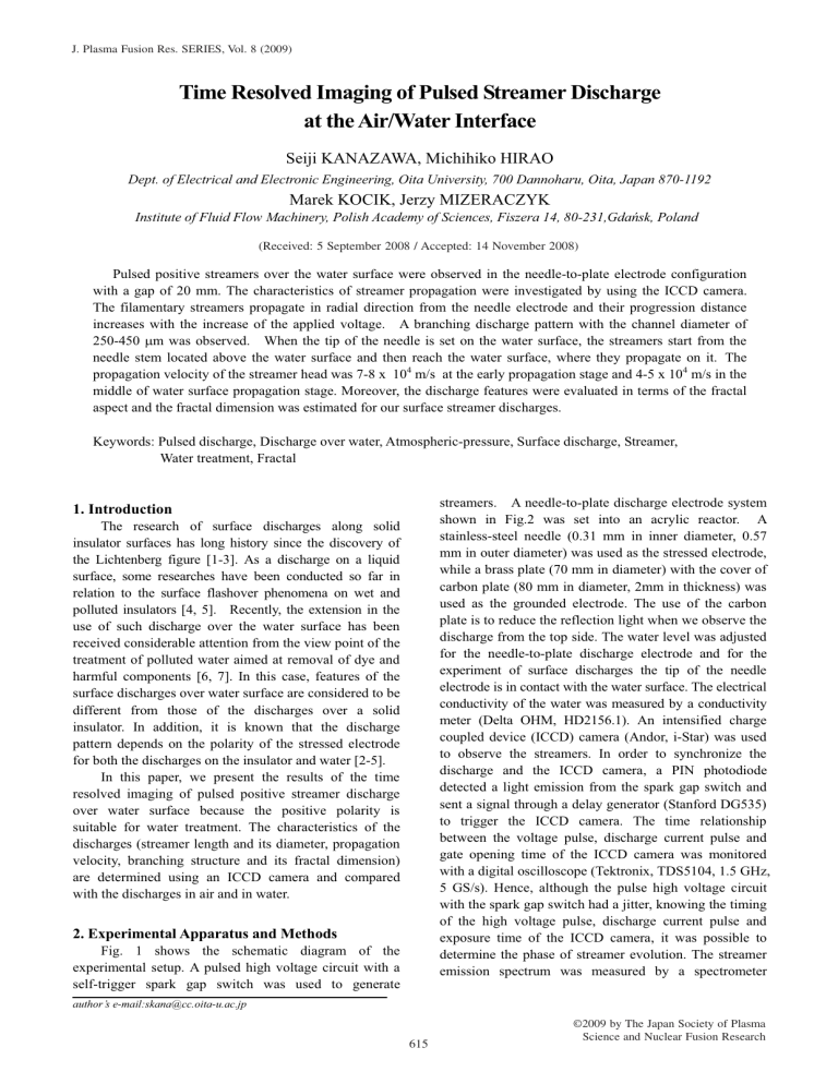Pulsed Streamer Discharge at Air/Water Interface